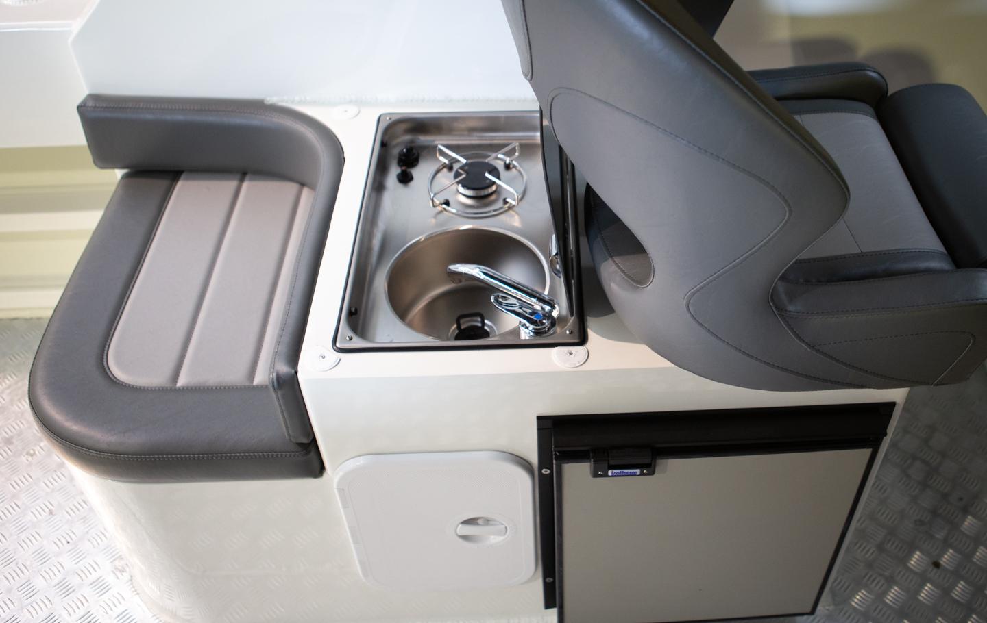 Inverloch Marine | Curved Seating with Fridge, Cooker Sink Combo and ...